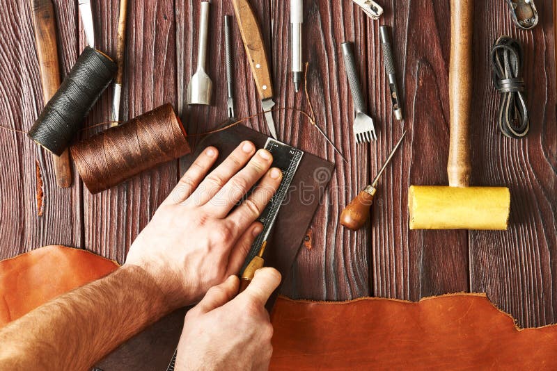 Man working with leather stock image. Image of rustic - 67970059