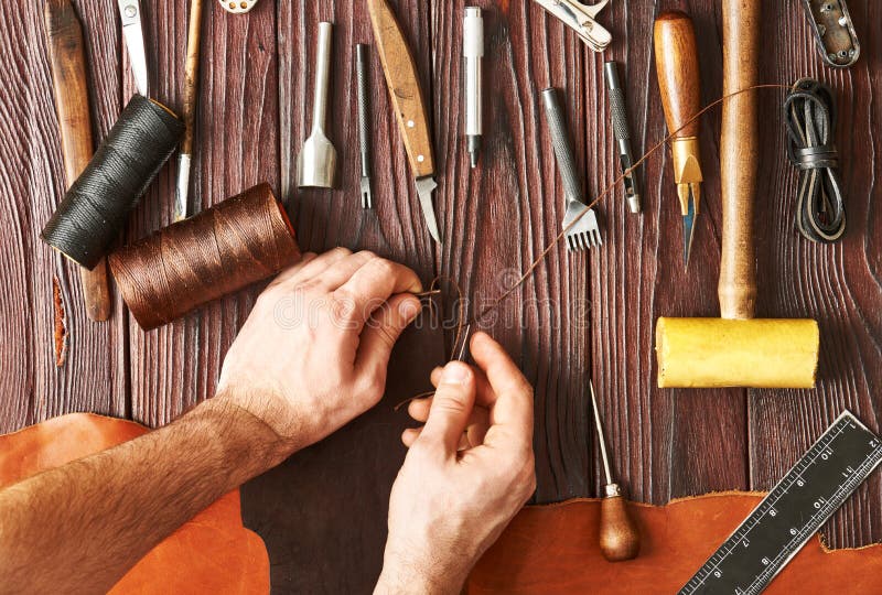 Man working with leather stock image. Image of leathercraft - 68755617