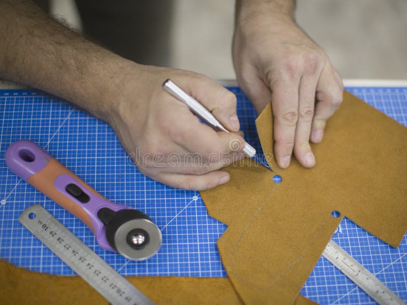 Man Working with Leather Using Crafting Tools. Close Up View of Males ...