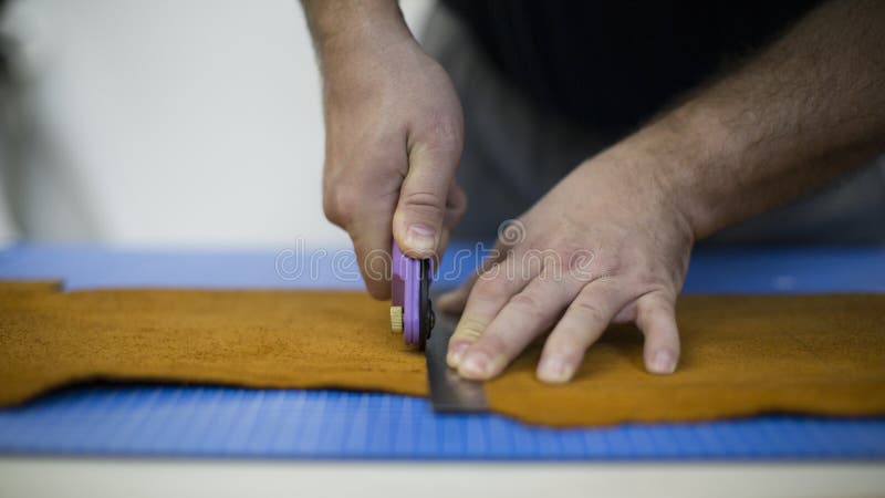 Man Working with Leather Using Crafting Tools. Close Up View of Males ...