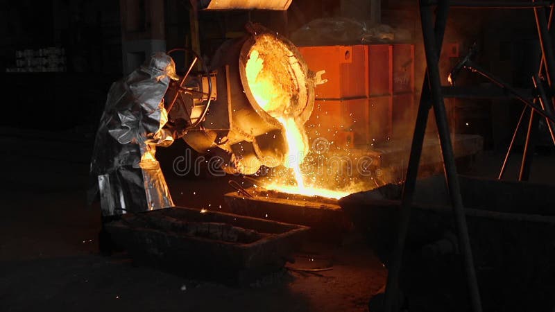 Man Working with Liquid Metal in Factory. Metal Factory Stock Footage ...