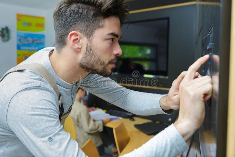 Man working on machine stock photo. Image of bore, metalwork - 278506608