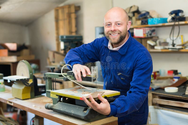 Wood Working Luthier Building a Guitar in His Workshop Stock Photo ...