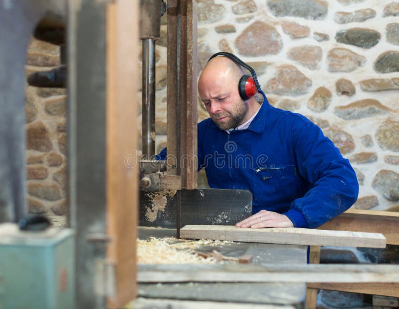 Man Working on a Machine at Workshop Stock Photo - Image of driller ...