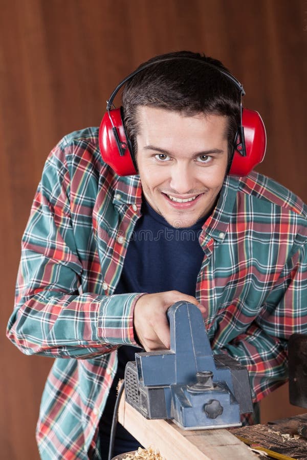 Man working with a machine stock image. Image of construction - 65242197