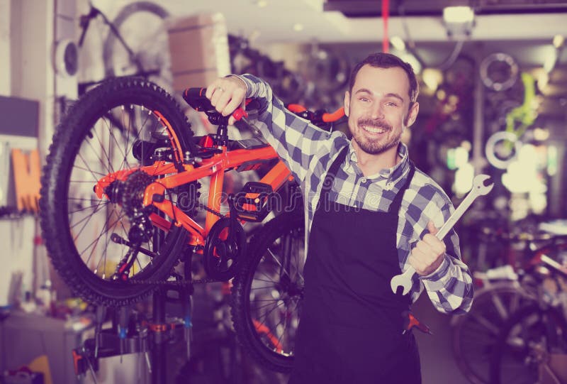 Man Working on Master Mechanic Assembling Bicycle Equipment Stock Image ...