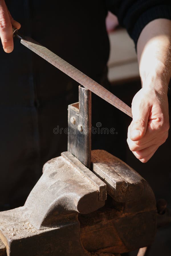 Man Working with Metal Vise Stock Photo - Image of artisan, metal: 88972870