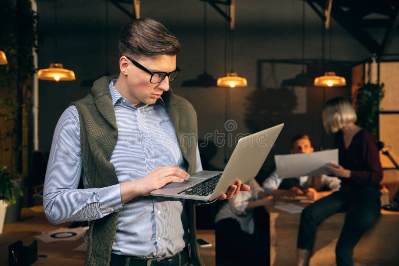 Man Working in Modern Office Using Devices and Gadgets during Creative ...
