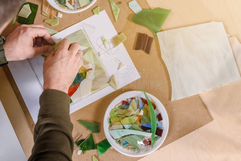 Man working with mosaic stock image. Image of detail - 126330573