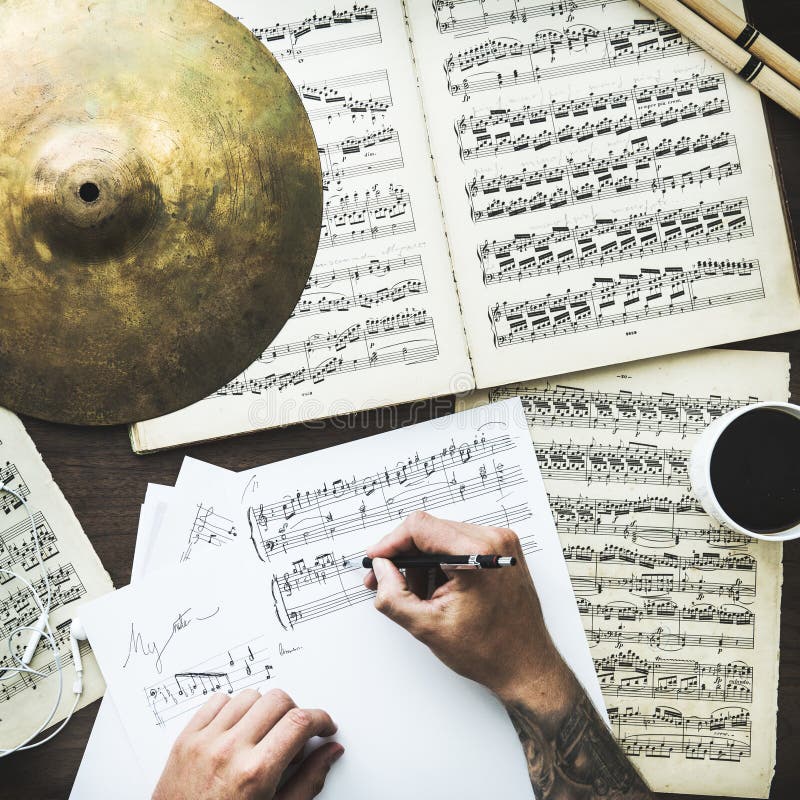 Man Working with Musical Notes Stock Image - Image of learning, tattoo ...
