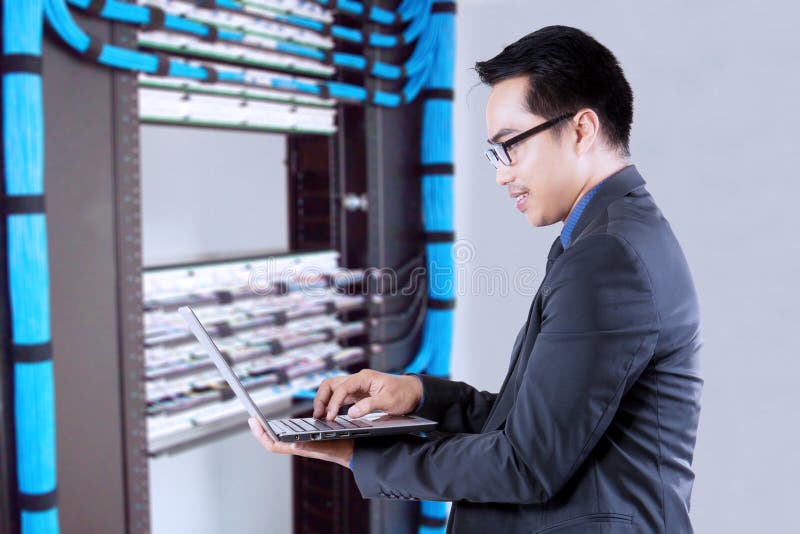 Man Working Near Network Servers Stock Photo - Image of glasses ...