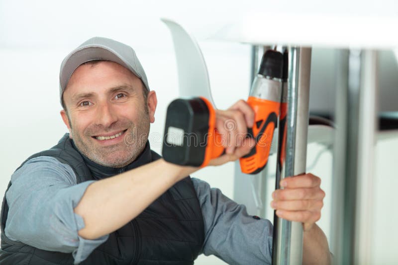 Man Working on New Kitchen and Using Powertool Stock Photo - Image of ...