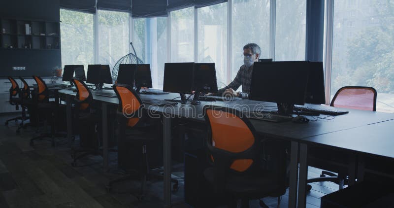 Man Working in Office Alone Stock Image - Image of workstation ...