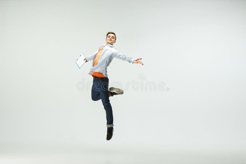 Man Working at Office and Jumping Isolated on Studio Background Stock ...