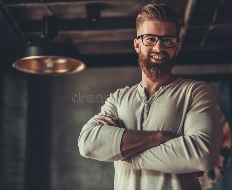 A Man while Working in an Office Stock Photo - Image of hipster, face ...