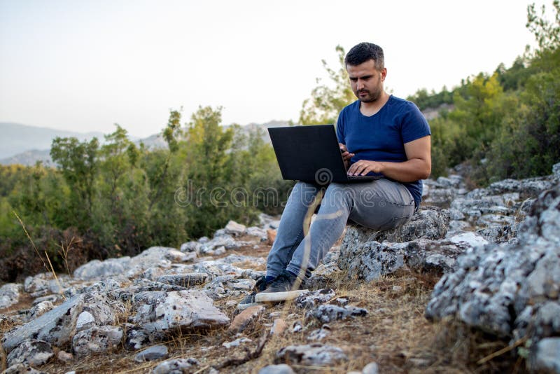 Man Working Online in the Jungle Stock Photo - Image of notebook ...