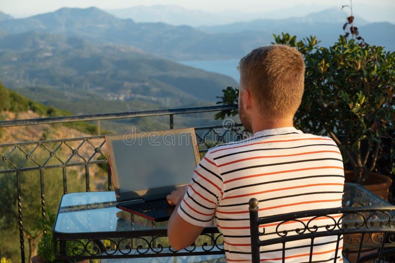 Man Working Online at Laptop,computer at Balcony with Breathtaking View ...