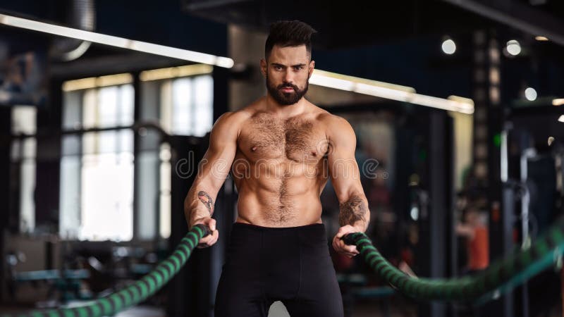 Man Working Out with Battle Ropes in Gym Stock Image - Image of athlete ...