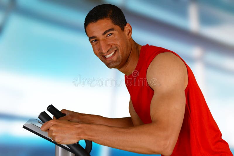 Man Working Out on Bike stock photo. Image of active - 38487040
