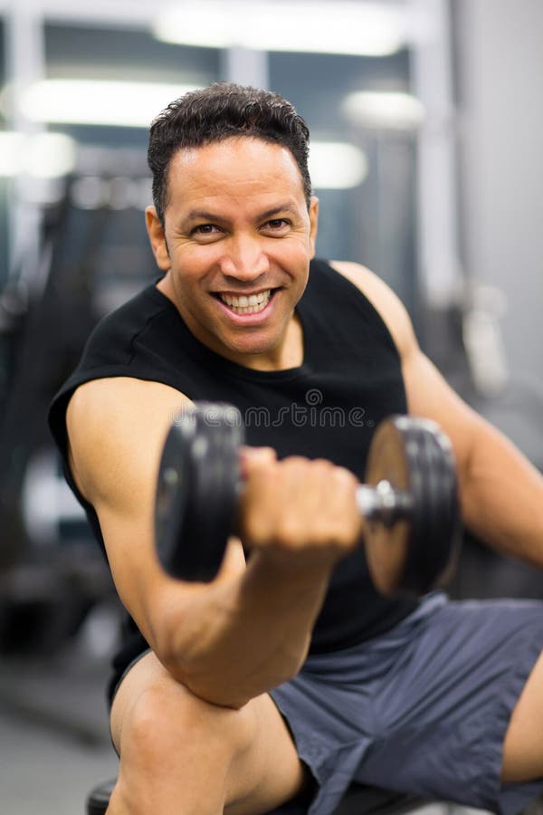 Man working out dumbbell stock image. Image of professional - 47294913