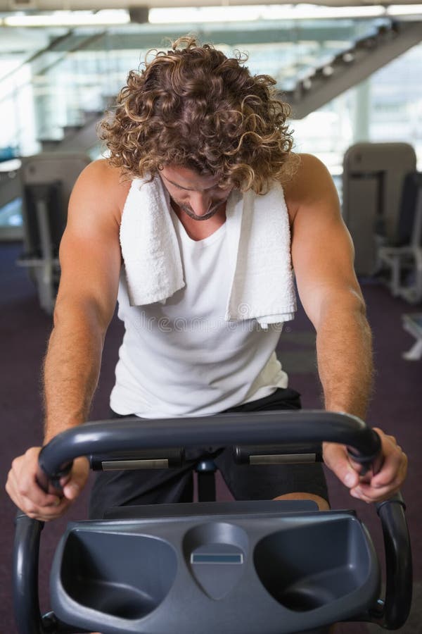 Man Working Out on Exercise Bike at Gym Stock Image - Image of view ...