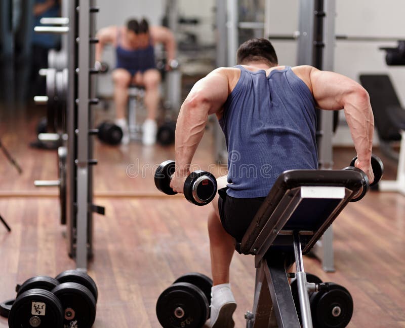 Man Working Out in Front of the Mirror Stock Image - Image of muscular ...
