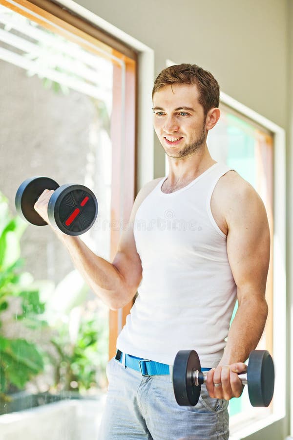 Man working out in gym stock image. Image of happy, human - 61747695