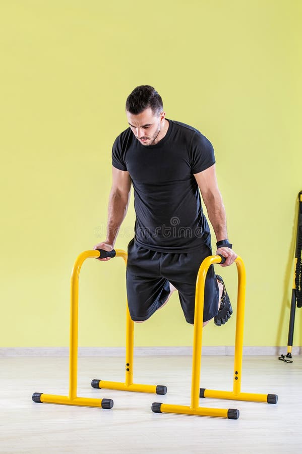 Man working out at gym stock photo. Image of exercise - 67082858