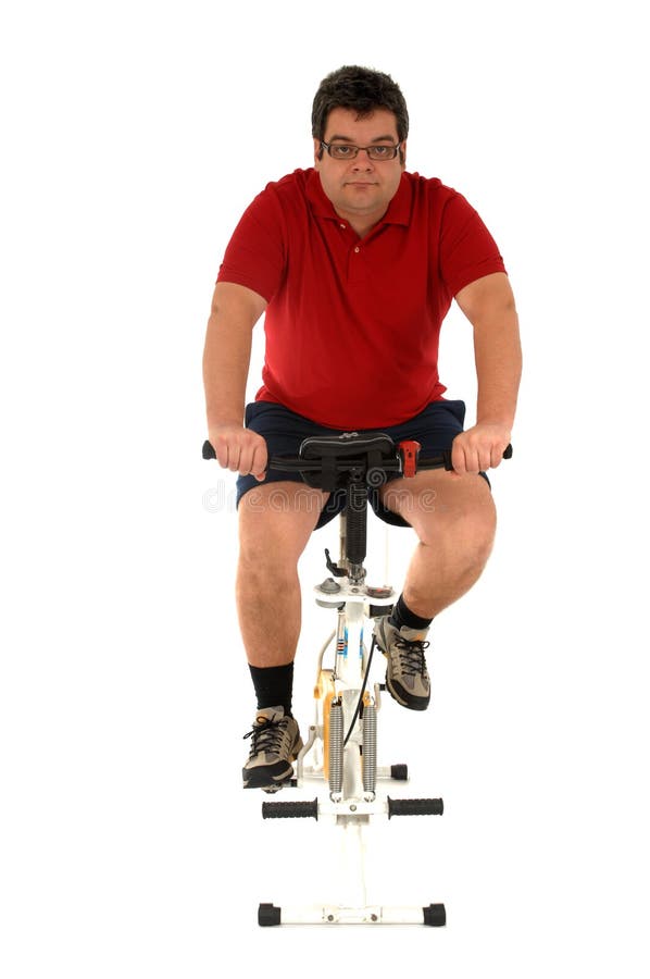 Man Working Out with a Static Bike Stock Photo - Image of body, active ...