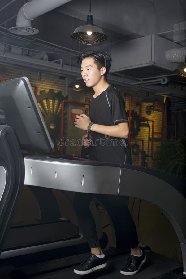 Man Working Out on a Treadmill at Gym Stock Image - Image of sporty ...
