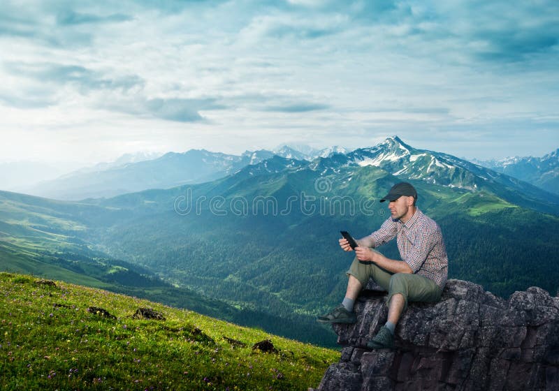 Man working outdoors stock photo. Image of mountains - 27016392