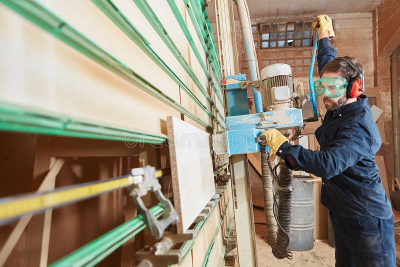 Man working with plate saw stock image. Image of wood - 107653233