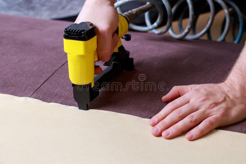 Man Working with Pneumatic Stapler Stock Image - Image of covering ...