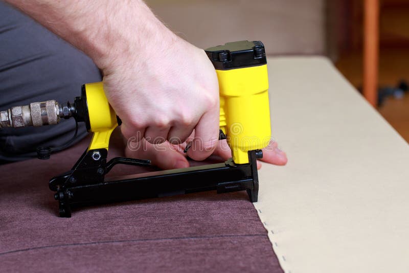 Man Working with Pneumatic Stapler Stock Photo - Image of stapling ...