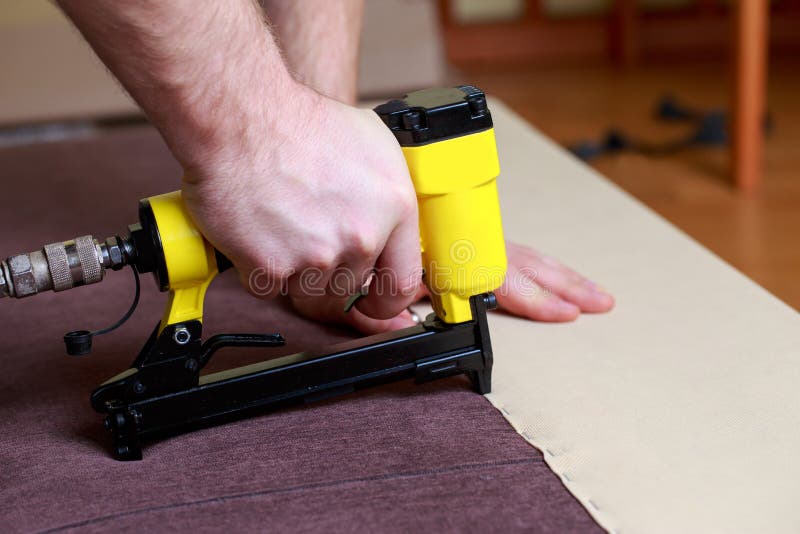 Man Working with Pneumatic Stapler Stock Image - Image of equipment ...