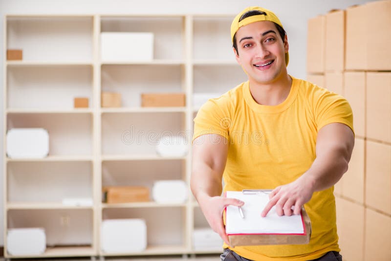 The Man Working in Postal Parcel Delivery Service Office Stock Image ...
