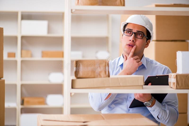 The Man Working in Postal Parcel Delivery Service Office Stock Image ...