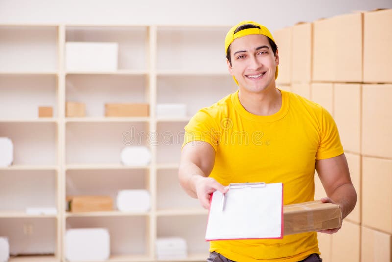 The Man Working in Postal Parcel Delivery Service Office Stock Image ...