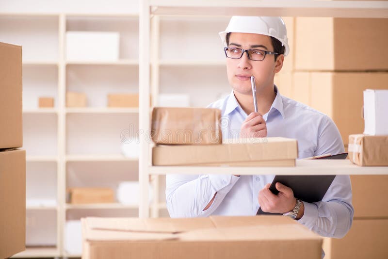 The Man Working in Postal Parcel Delivery Service Office Stock Image ...