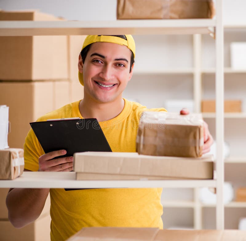 Man Working in Postal Parcel Delivery Service Office Stock Photo ...