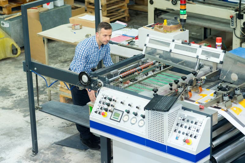 Man Working in Printing Factory Stock Photo - Image of publishing ...