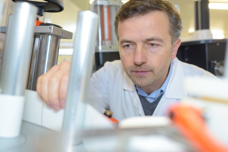 Man Working on Printing Machine Stock Photo - Image of paper ...