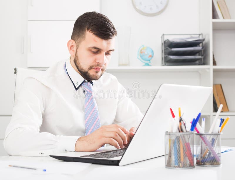 Man working productively stock photo. Image of office - 205502772