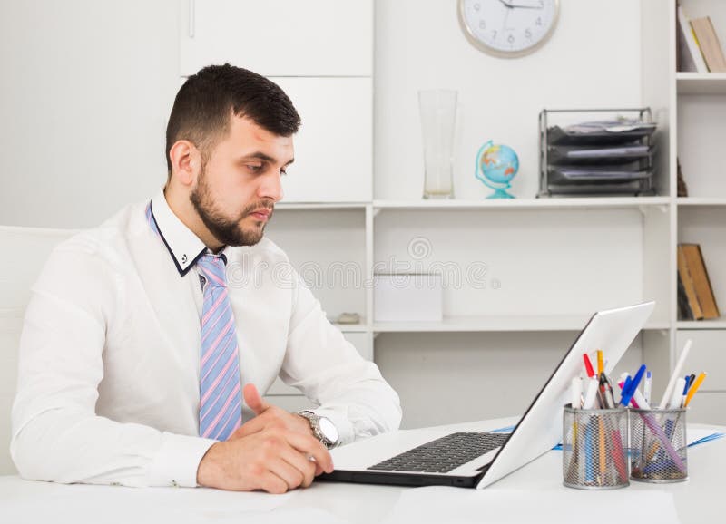 Man working productively stock photo. Image of smiling - 222561204