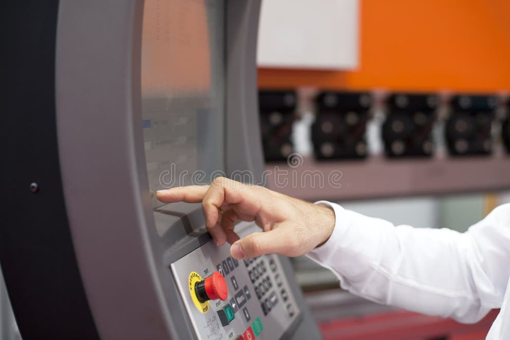 Man Working at Programmable Machine Stock Image - Image of button ...