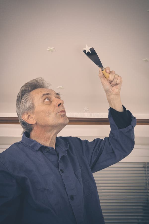 Man Working on Refresh of Walls and Ceiling before New Painting of ...