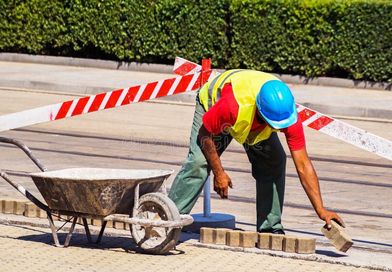 Man is Working at the Road Construction Stock Photo - Image of middle ...