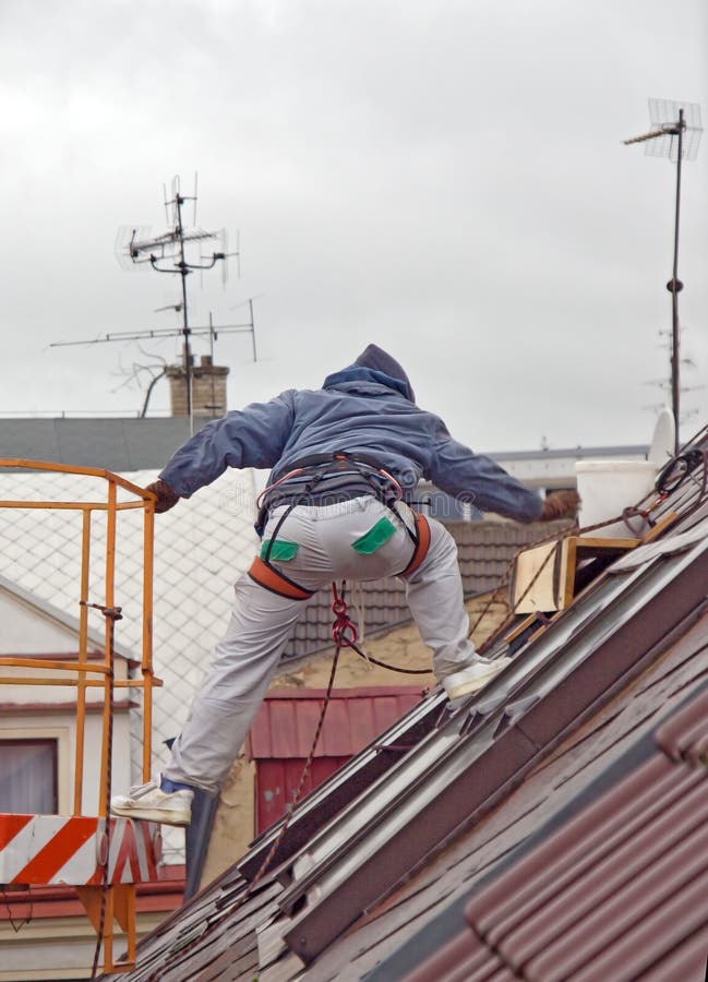 Man working on roof stock image. Image of laborer, outdoors - 16263895