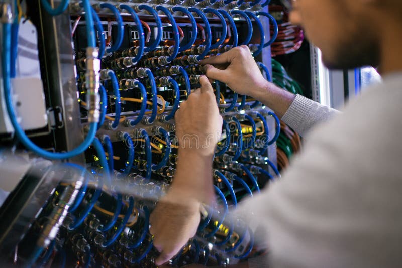 Man Working with Server Cabinet Stock Image - Image of administrator ...