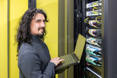 Man Working with Servers in Data Center Stock Image - Image of ...